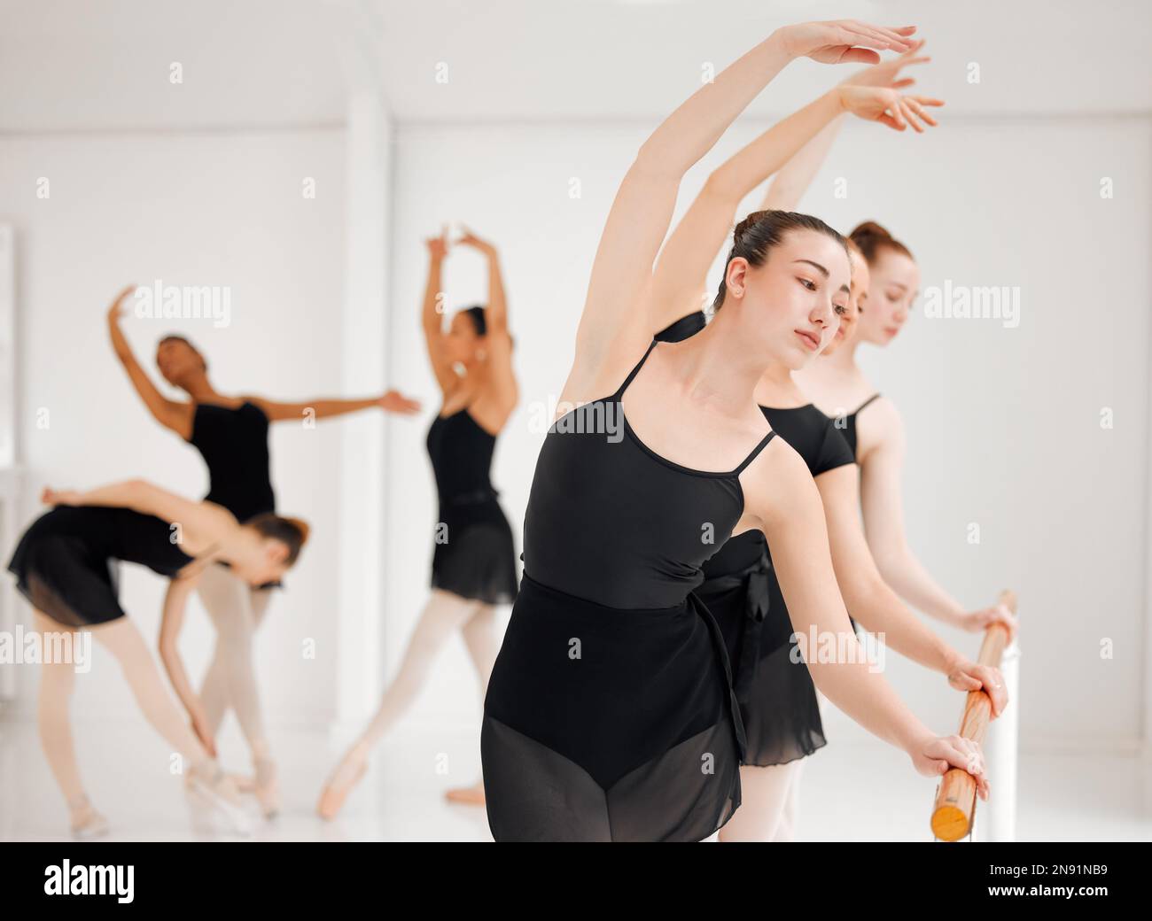 Twists and turns of the disciplined. a group of ballet dancers ...