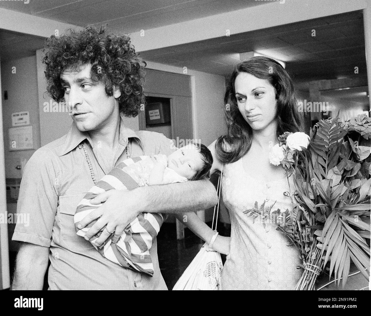 Yippie leader, Abbie Hoffman and wife Anita, pose in their Mt. Sinai ...