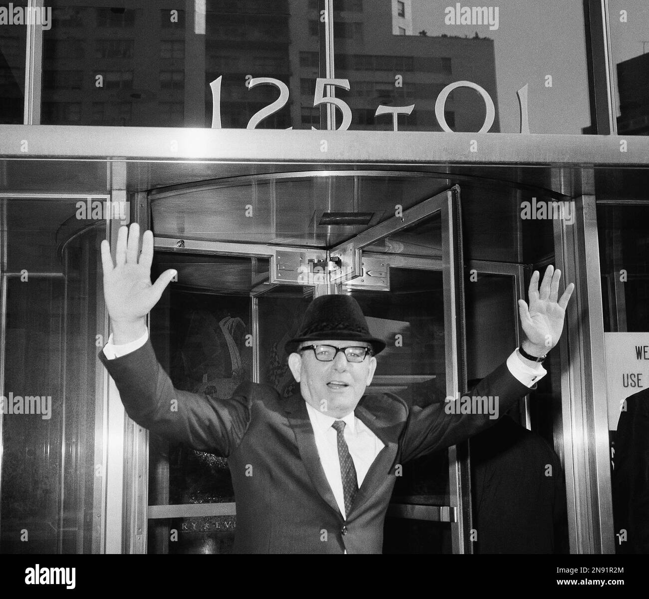 Mafia boss Santo Trafficante, of Tampa Fla., waves before a Grand Jury ...
