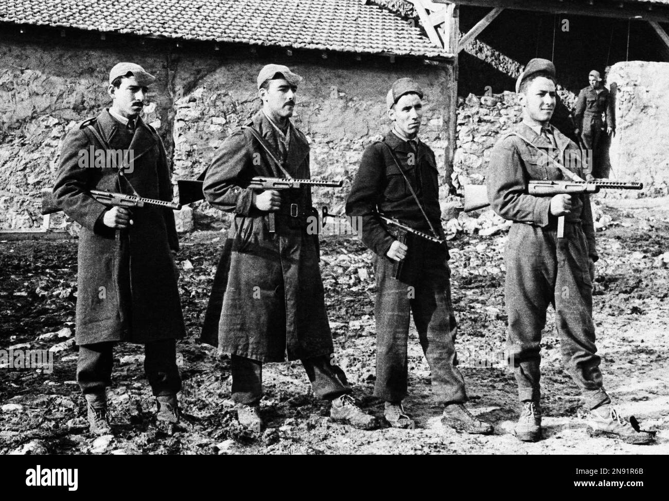 Four soldiers of the Algerian National Liberation Army forming a ...