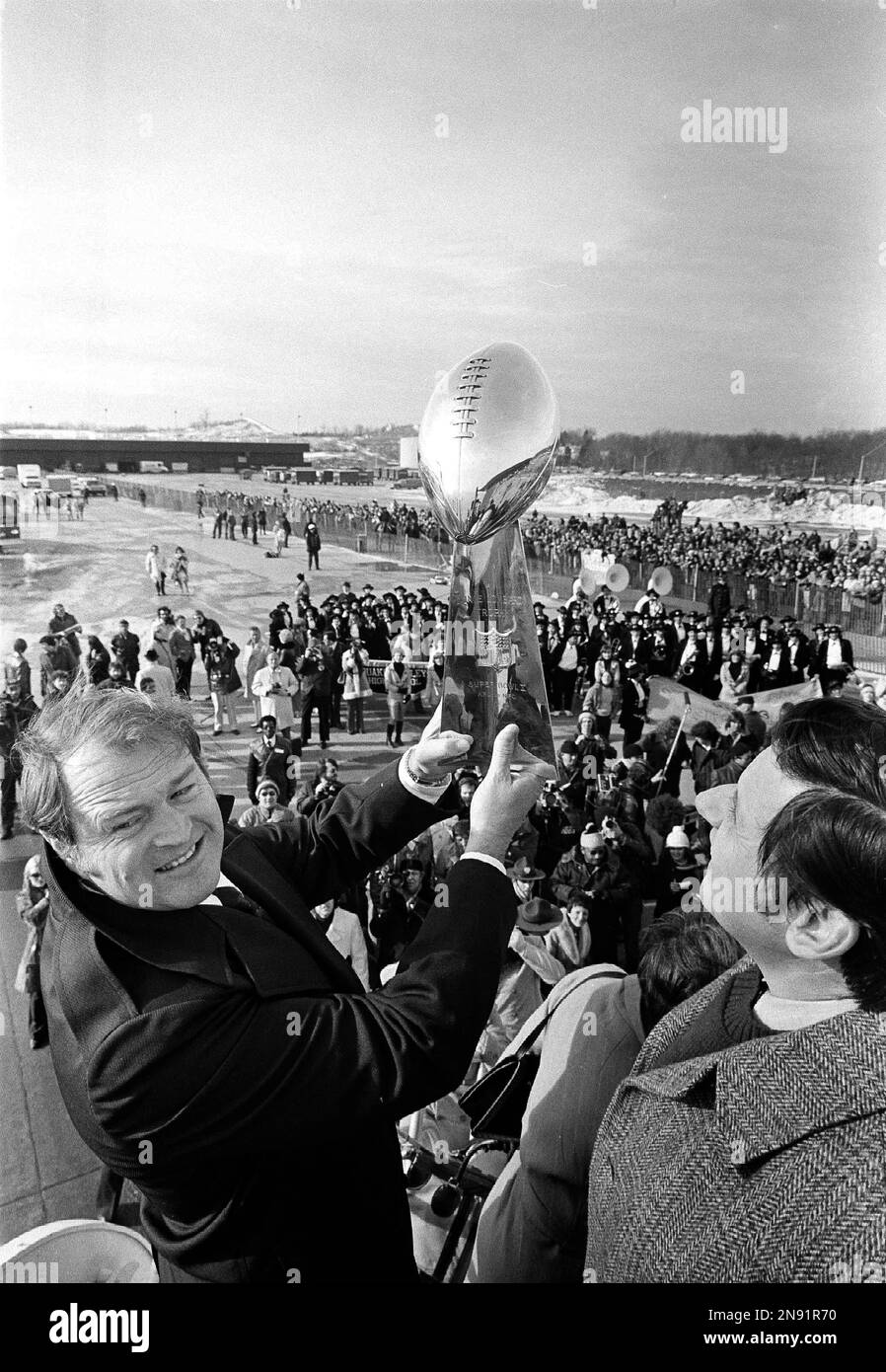 Pittsburgh Steelers coach Chuck Noll, left, holds the Super Bowl trophy ...