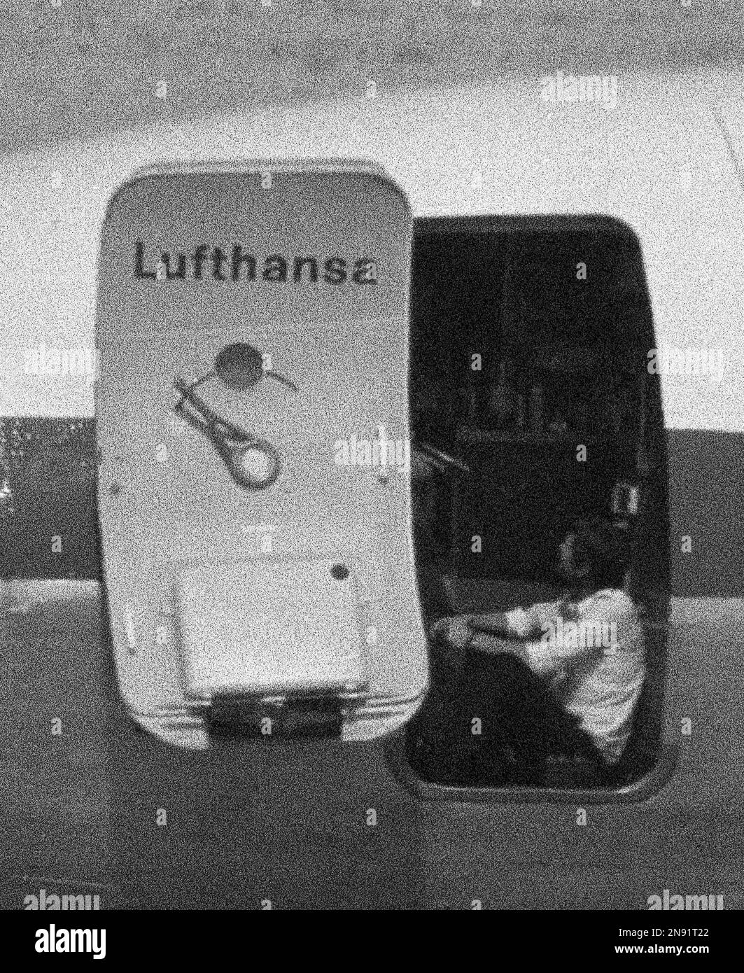 A crewman, identified as pilot Juergen Schumann, is threatened with a ...
