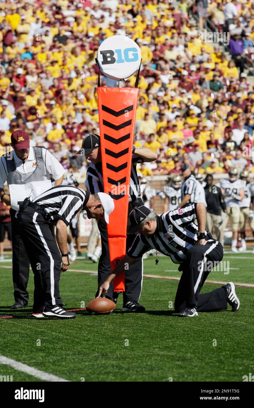 Big 10 officials, from left to right, John O'Neil, Mike Pilarski, and ...