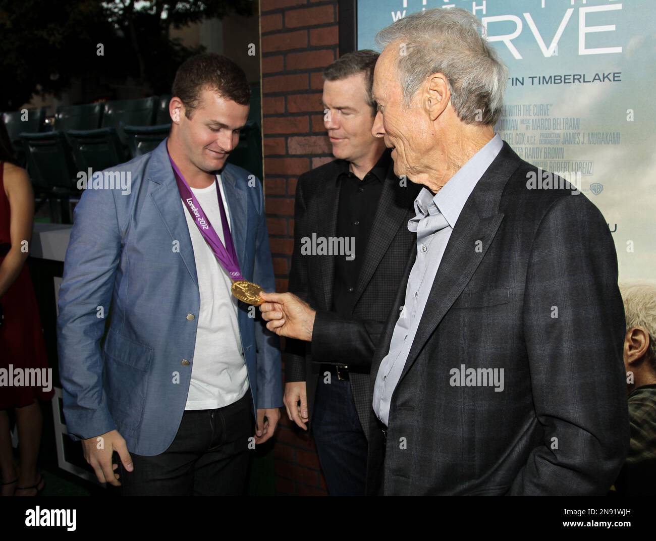 Cast member Clint Eastwood, right, director Robert Lorenz, center ...