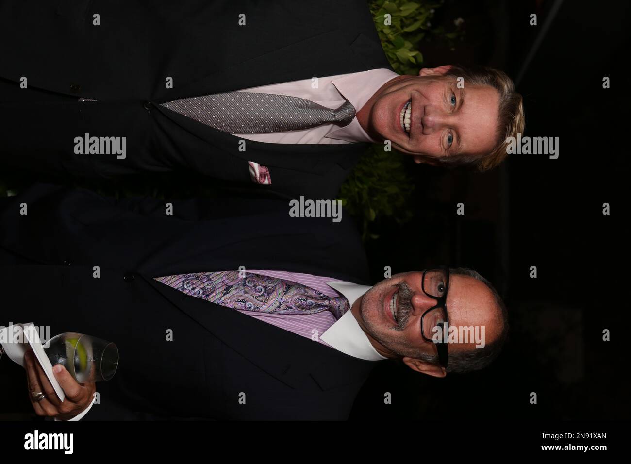 From left, Michael Moser, Harry Winston and Michael Rudder pose during ...
