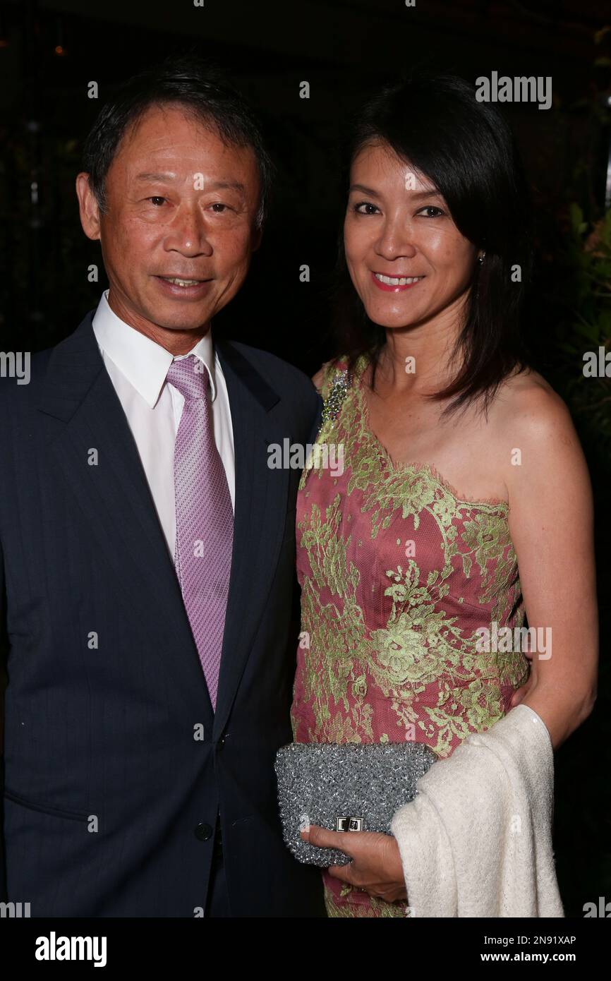 From left, S.L. Huang and Betty Huang pose during the South Coast Plaza ...