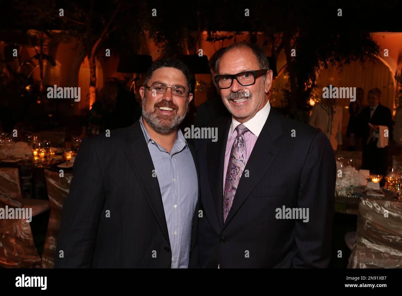 From left, Eric Spitz, President of Freedom Communications and Michael ...