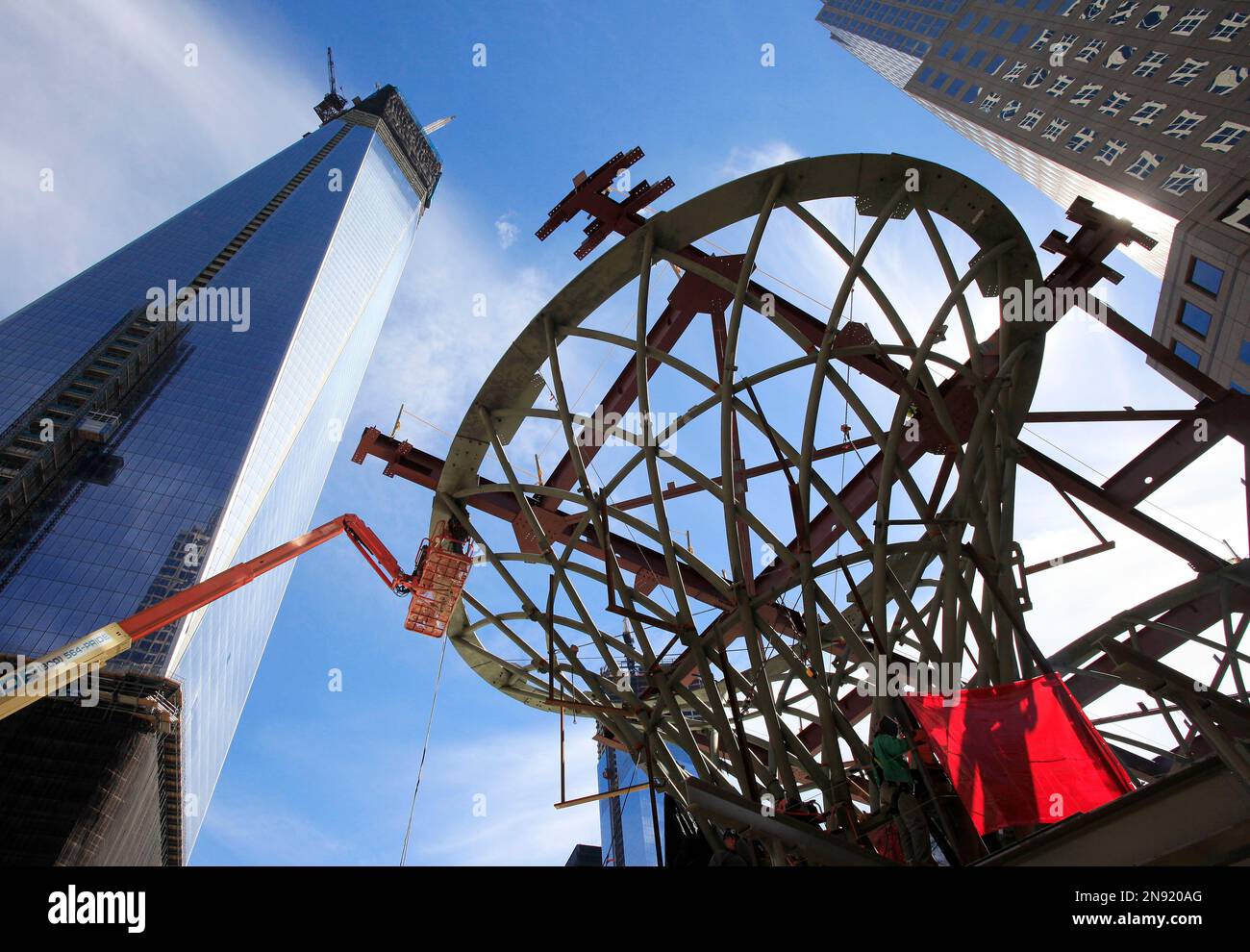 The steel tubing of a basket column, center, takes shape beneath 1 ...