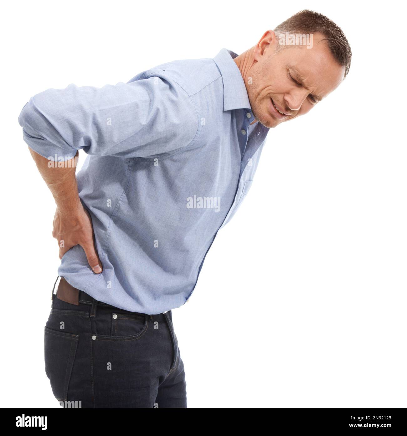Injury, business man and back pain in studio isolated on a white ...