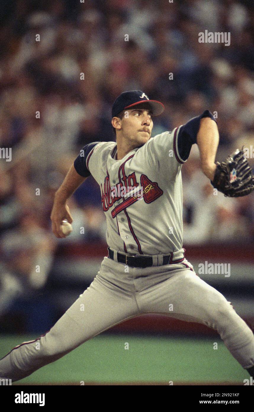 Atlanta Braves pitcher John Smoltz winds up for a pitch against the ...