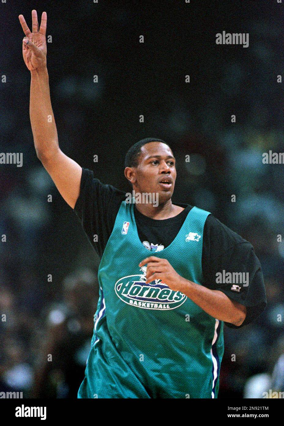 Percy Miller signals after hitting a three-point shot during a ...