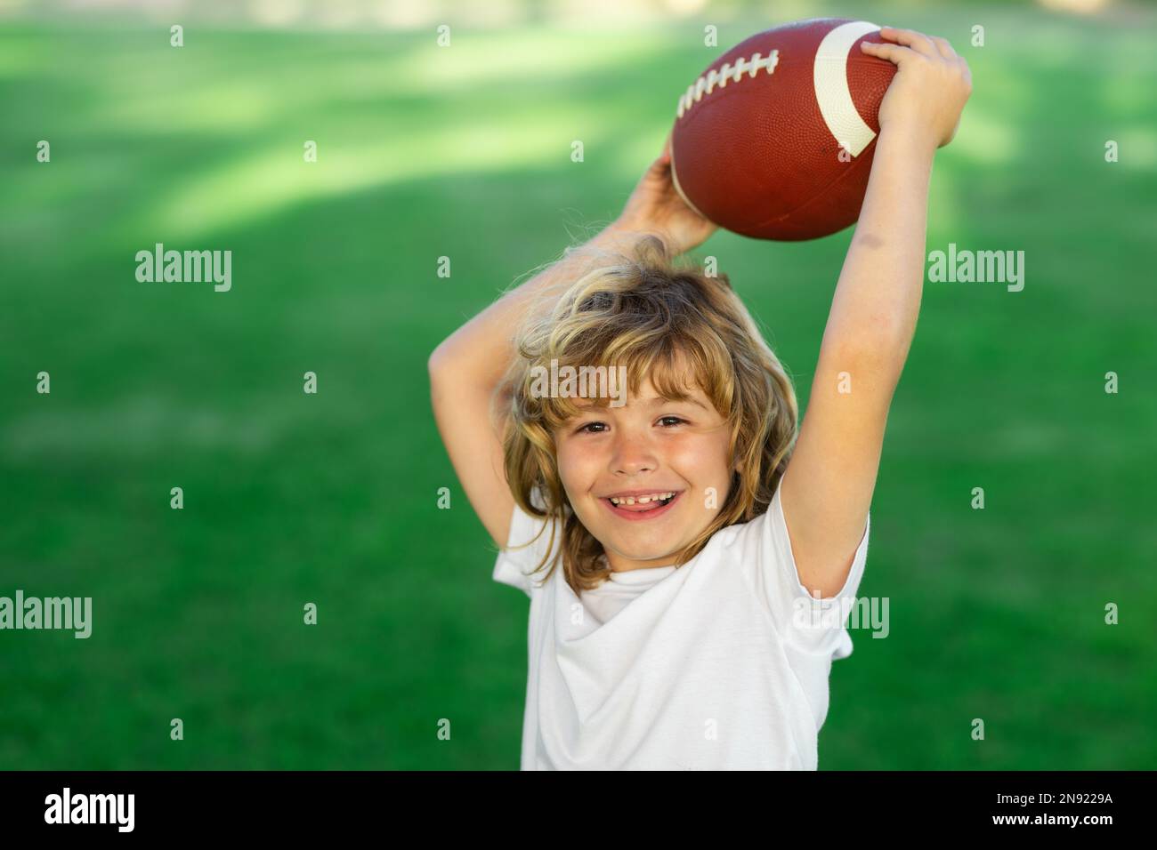 American style football. Kids and sports. Young boy playing american ...