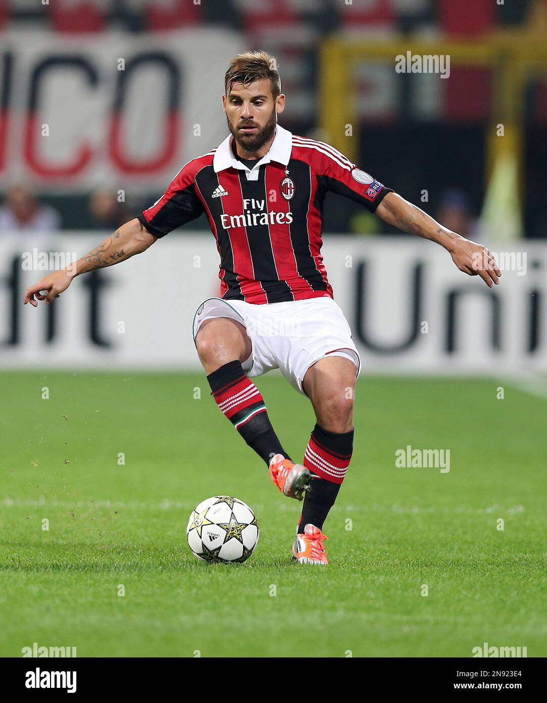 AC Milan midfielder Antonio Nocerino controls the ball during a ...