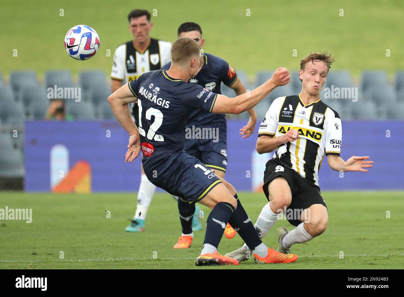 Jake Holman of the Bulls and Lucas Mauragis of the Phoenix challenge ...