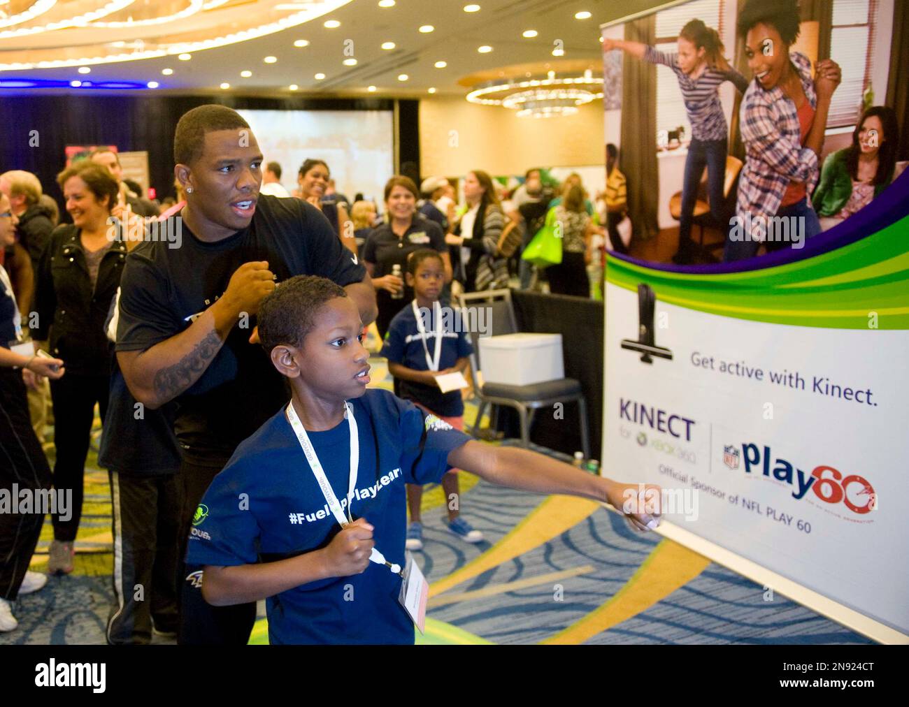 Baltimore Ravens running back Ray Rice and Nicholas Moore, front, box ...