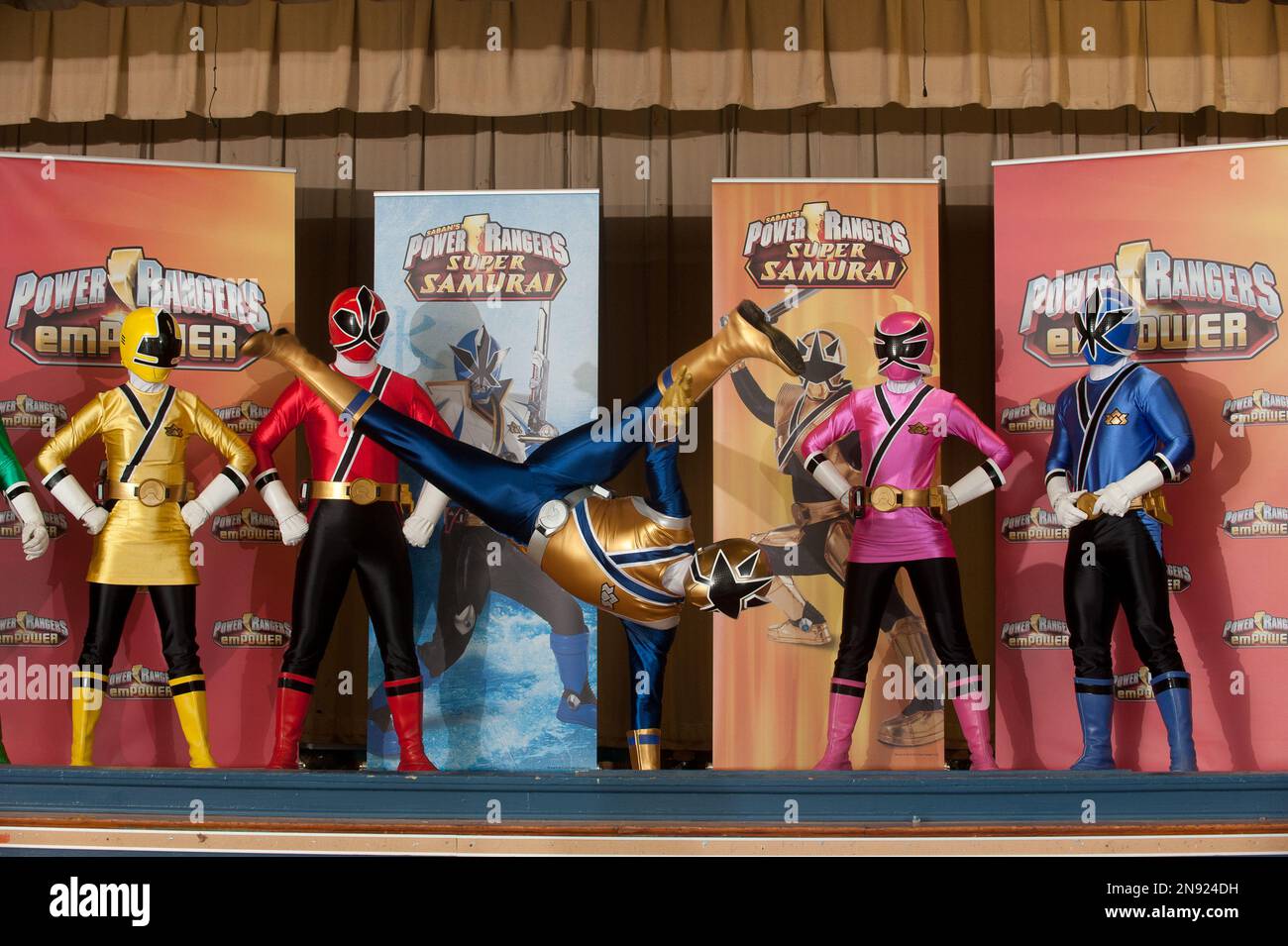 Power Rangers demonstrate moves during the Power Rangers emPOWER ...