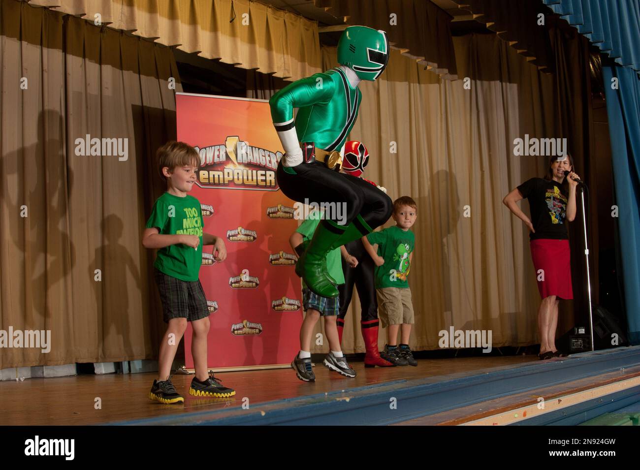 Power Rangers demonstrate moves during the Power Rangers emPOWER ...