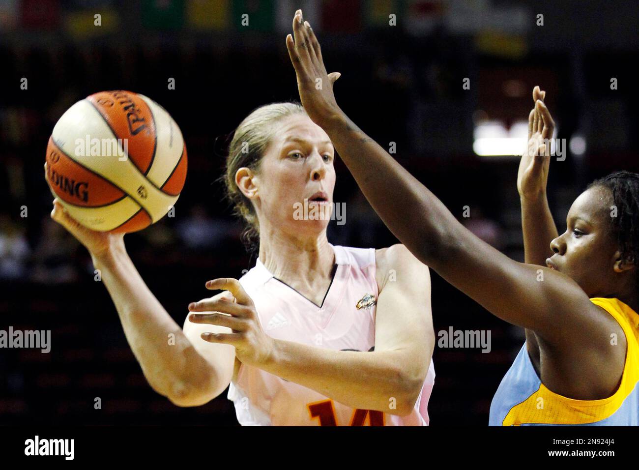 Seattle Storm's Katie Smith (14) tries to pass around Chicago Sky's ...