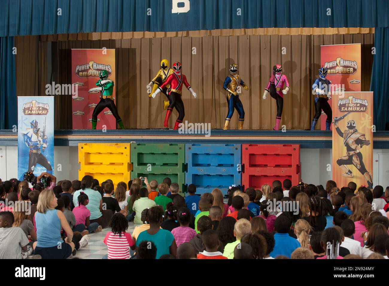 Power Rangers demonstrate moves during the Power Rangers emPOWER ...