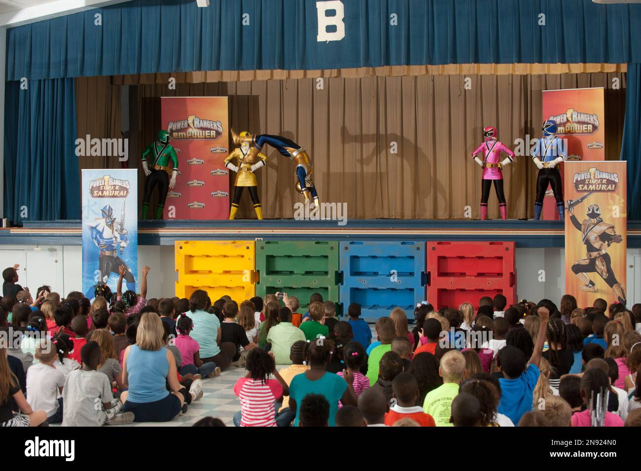 Power Rangers demonstrate moves during the Power Rangers emPOWER ...