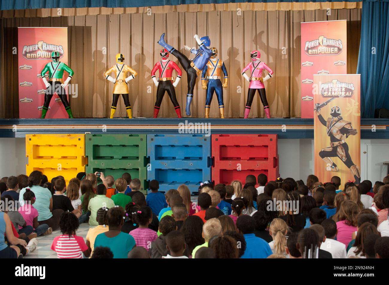 Power Rangers demonstrate moves during the Power Rangers emPOWER ...