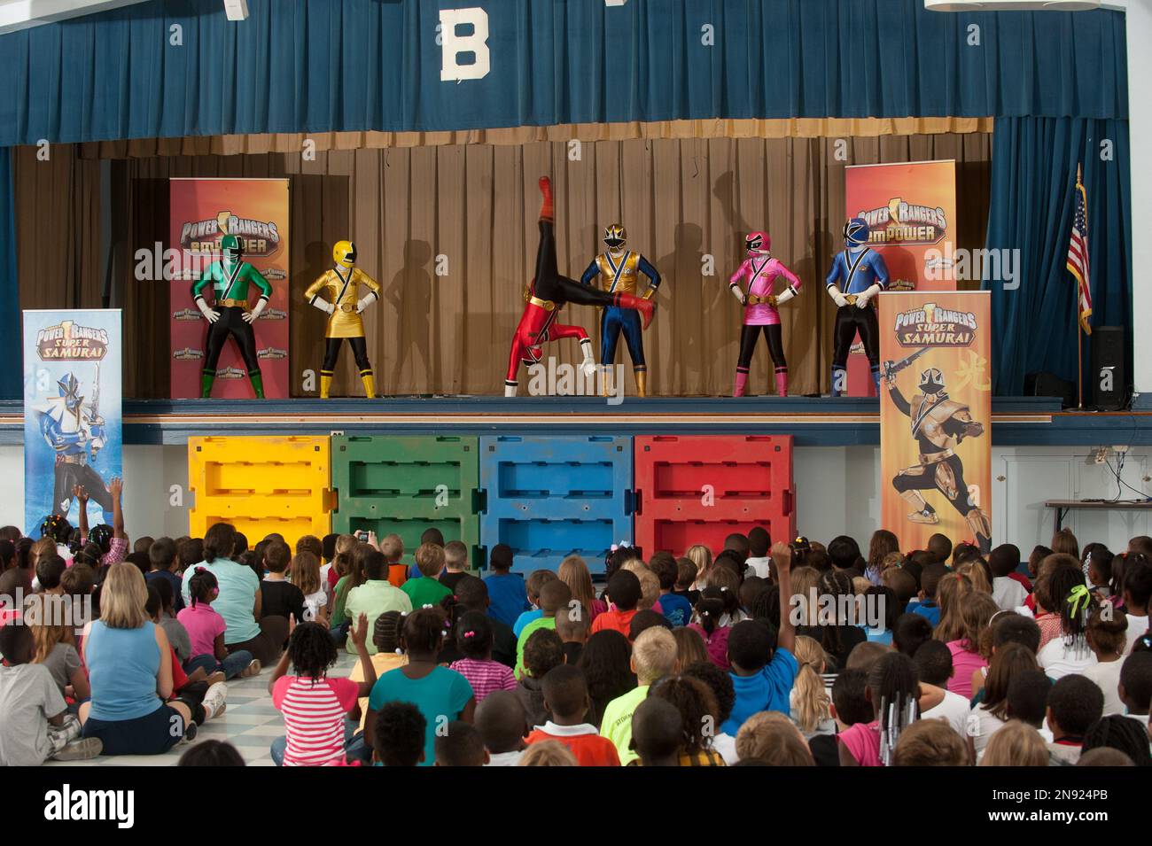 Power Rangers demonstrate moves during the Power Rangers emPOWER ...
