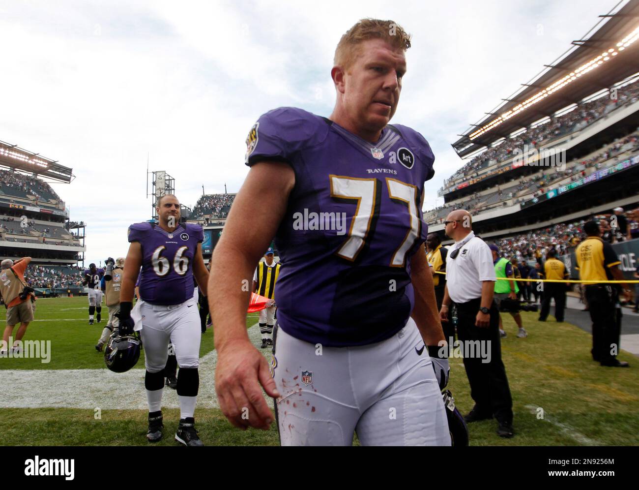 Baltimore Ravens center Matt Birk (77) walks from the field after an ...