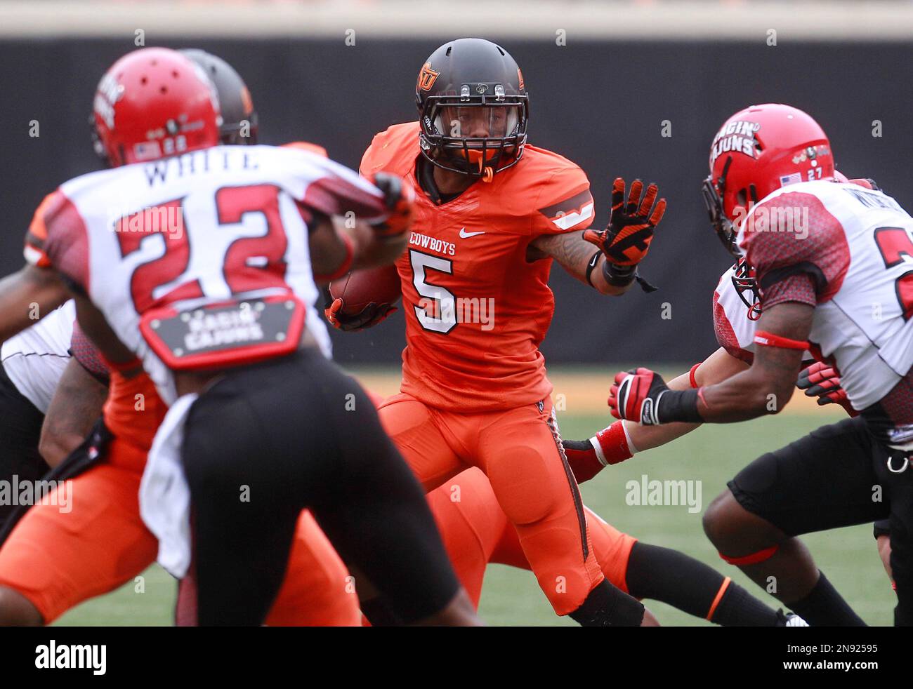 Oklahoma State wide receiver Josh Stewart (5) carries against Louisiana ...