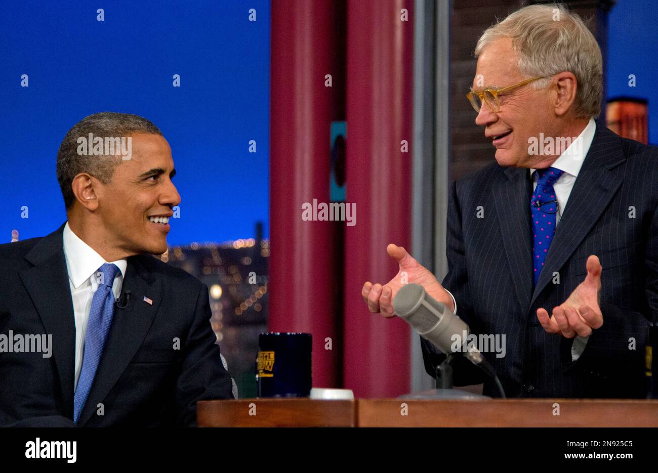 President Barack Obama talks with David Letterman on the set of the ...