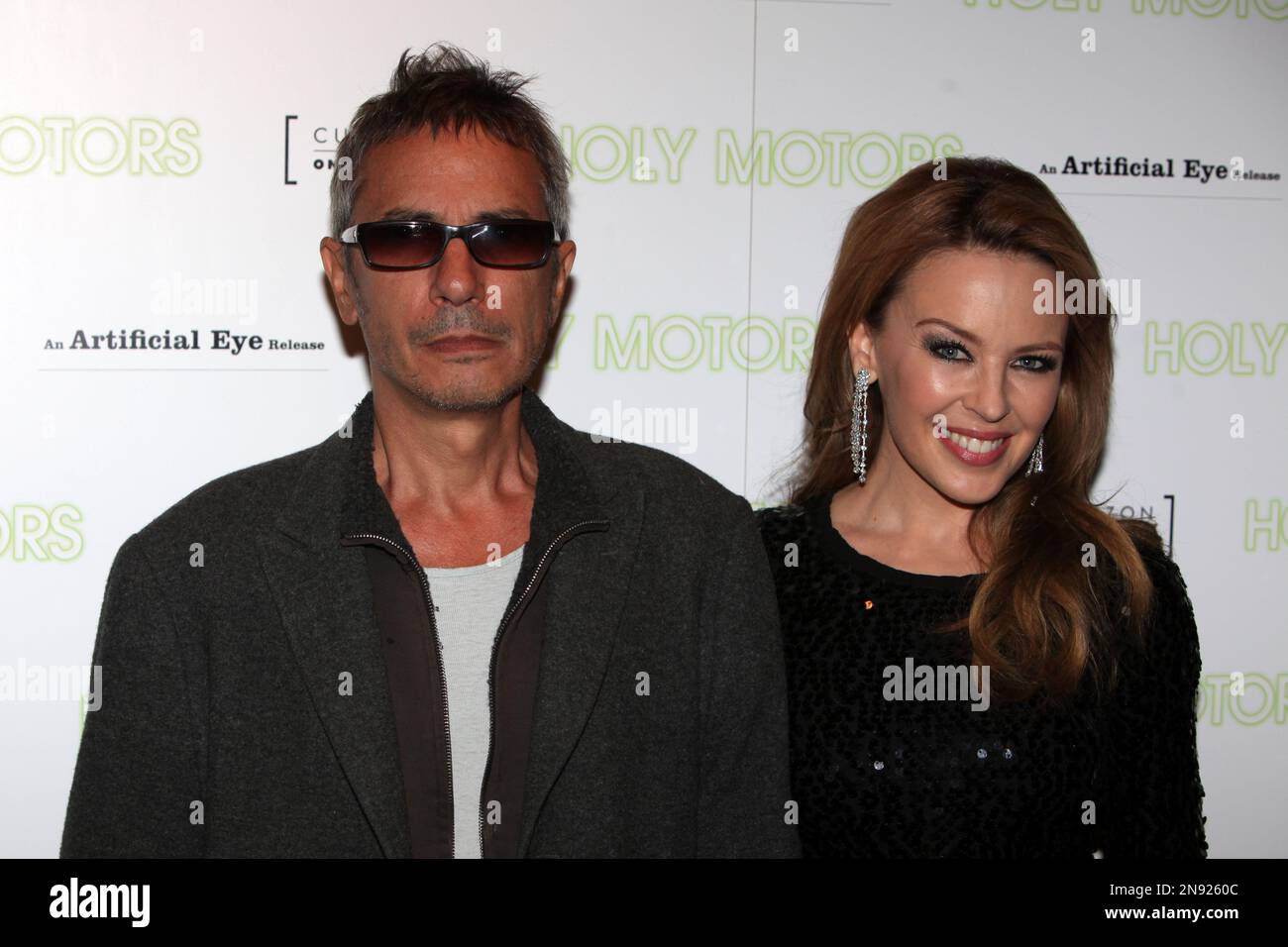Director Leos Carax, left, and Kylie Minogue are seen at the UK ...