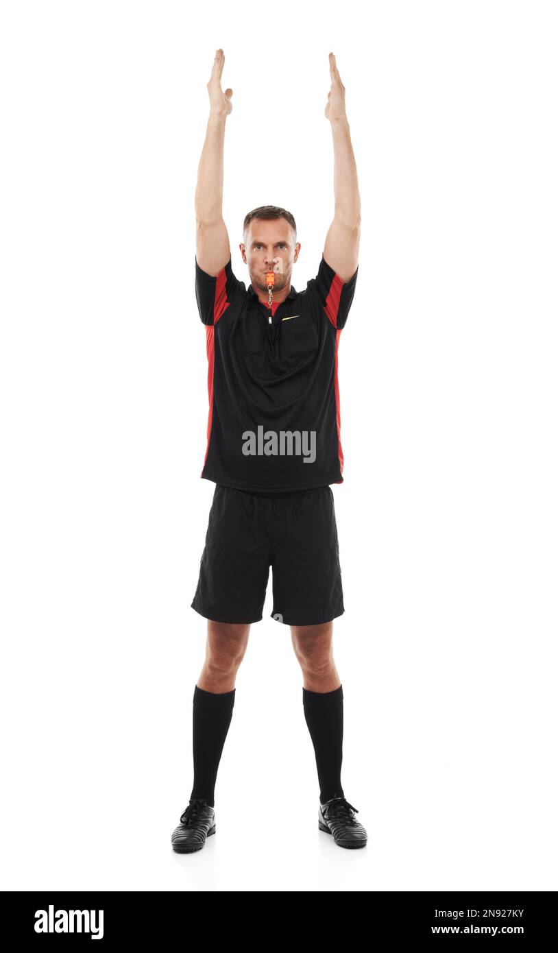 Referee, man whistle in portrait and arms raised, stop game with soccer ...