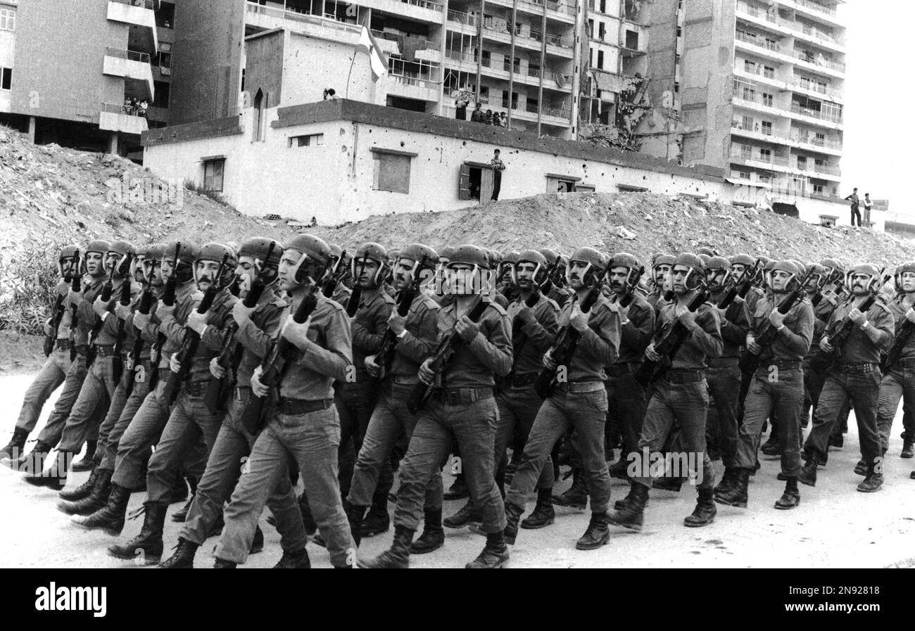 With a backdrop of rubble and war-damaged buildings, Lebanese Army ...