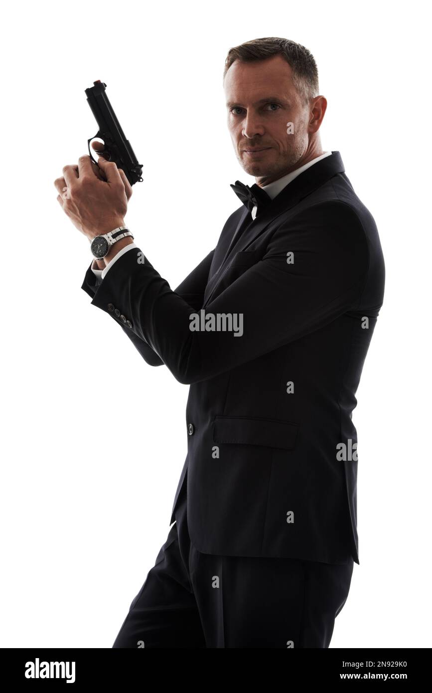 Secret agent man with gun isolated on a white background for law ...