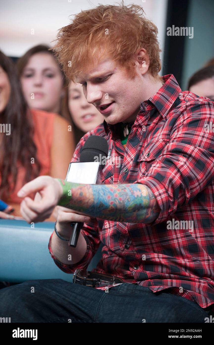 Singer Ed Sheeran speaks during his interview on New.Music.Live. at the ...