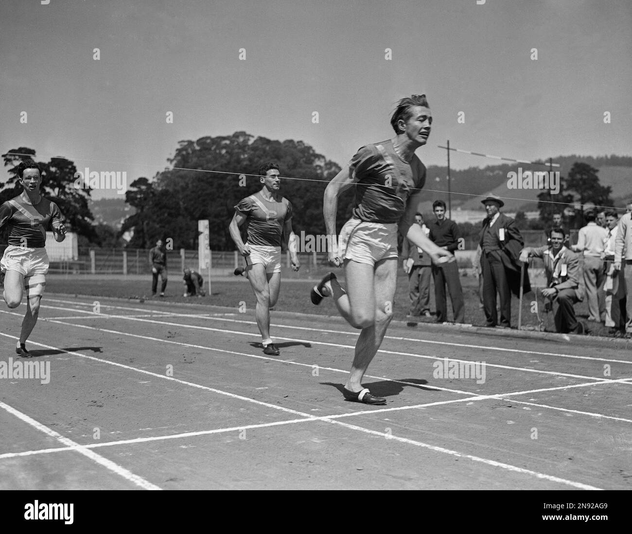 100 yard dash action won by Herald Davis in 9.8 second Jim Jurkovich of Calif. and Dave Rhoades ...