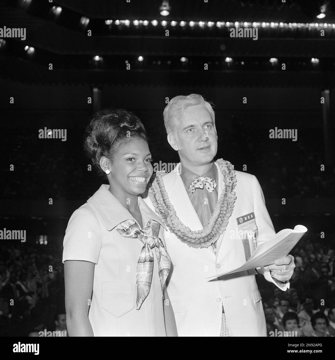 George D. Fischer, President of the National Education Association, presents Miss Iowa, 19-year ...