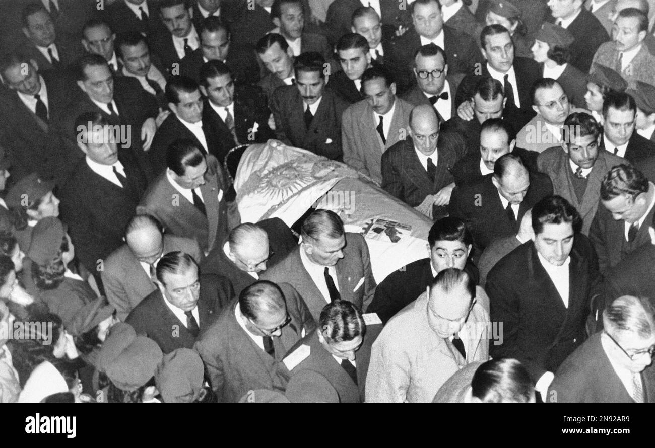 The casket bearing the body of Eva Peron is carried into the Labor ...