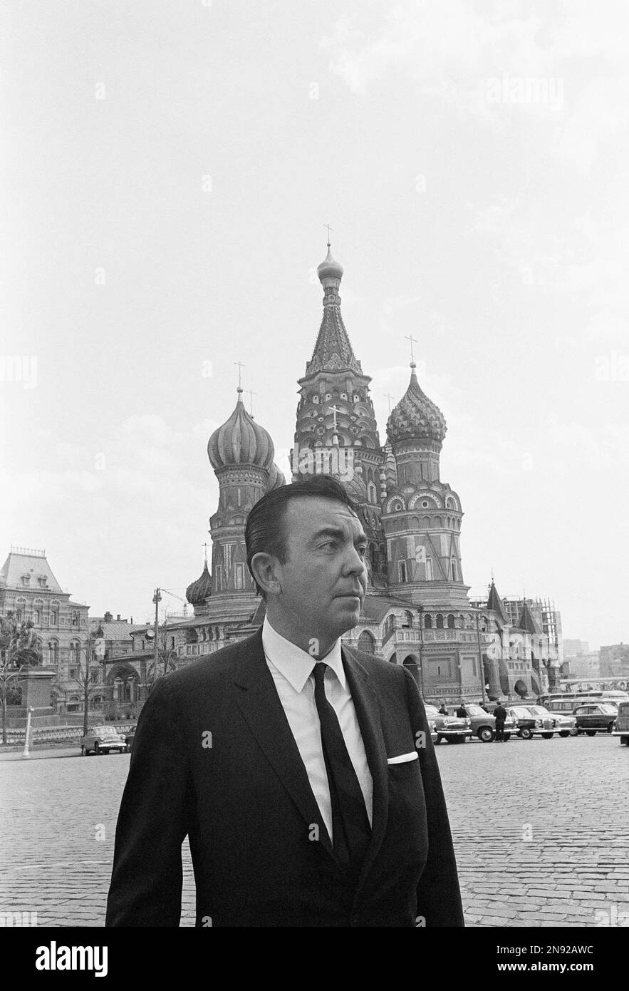 Gordon McLendon is shown with St. Basil's Cathedral in the background ...