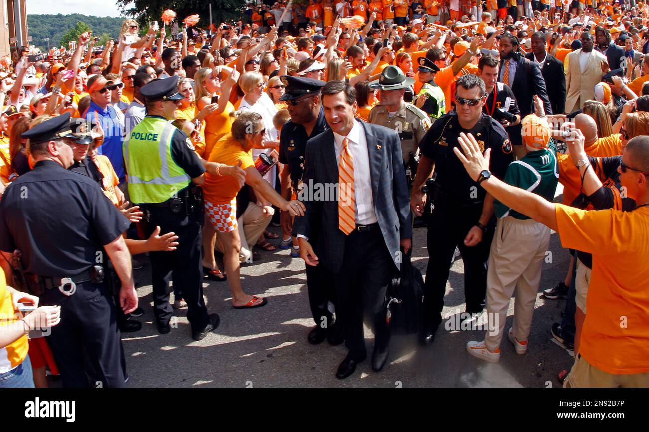 Tennessee Volunteers head coach Derek Dooley is greeted by fans during ...