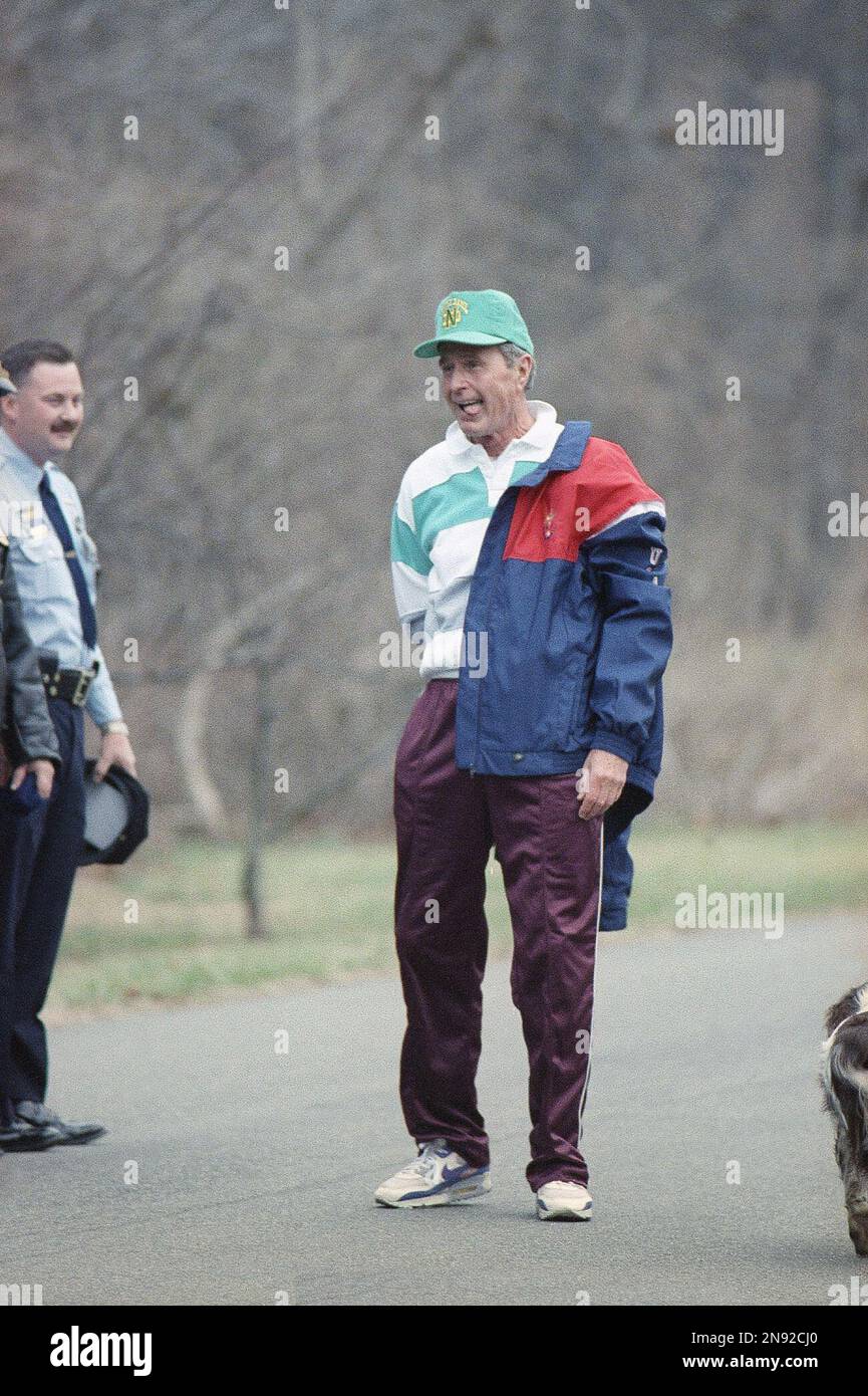President George Bush looks a little tired after finishing a two-mile ...