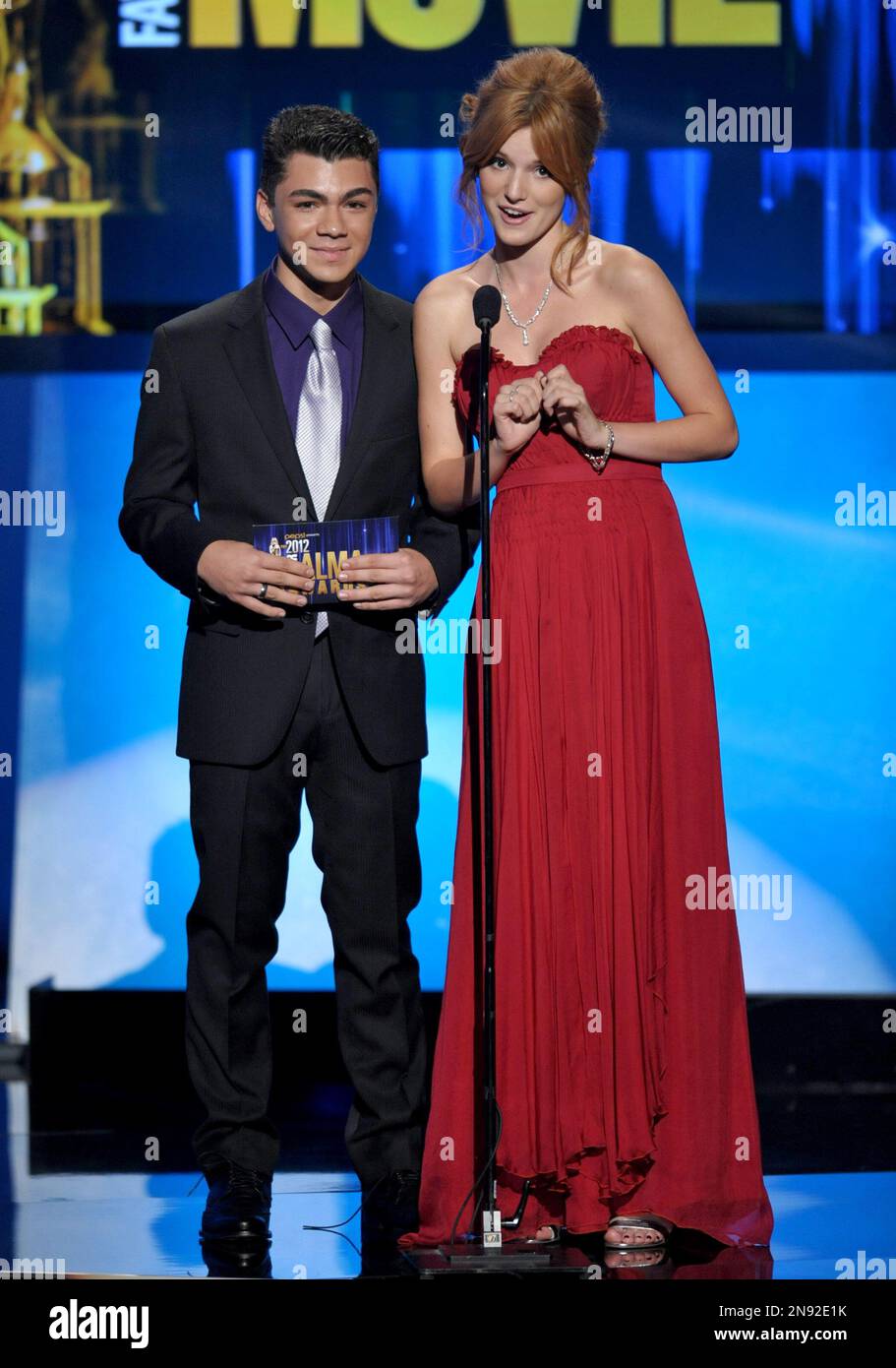 Adam Irigoyen, left, and Bella Thorne present the award for favorite ...