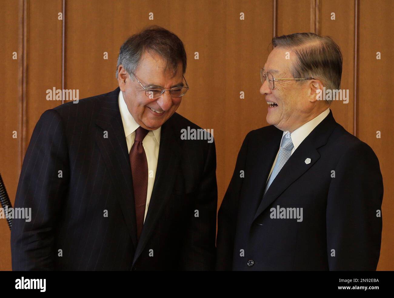 U.S. Defense Secretary Leon Panetta, left, shares a laugh with his ...