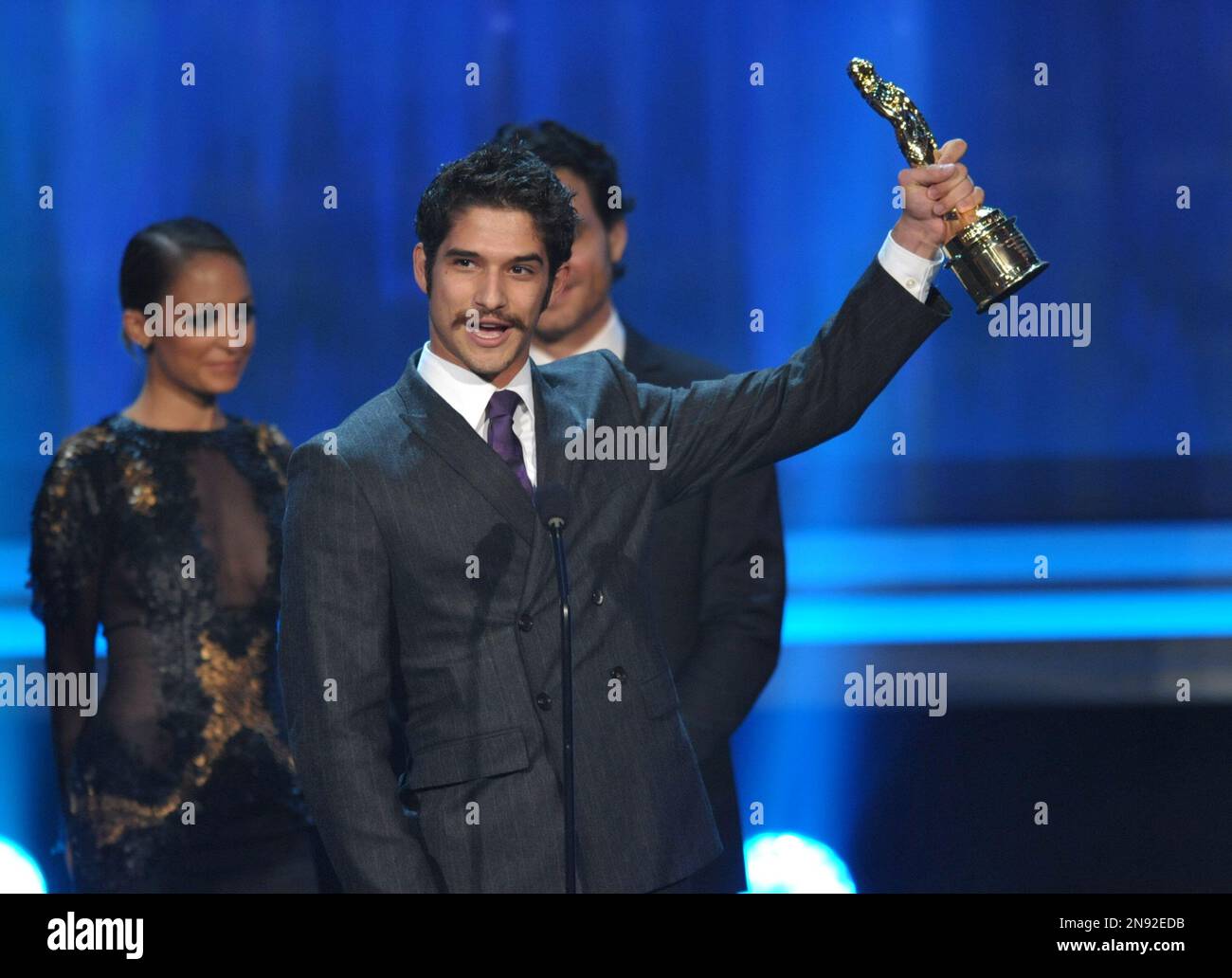 Tyler Posey accepts the award for favorite TV actor at the ALMA Awards ...