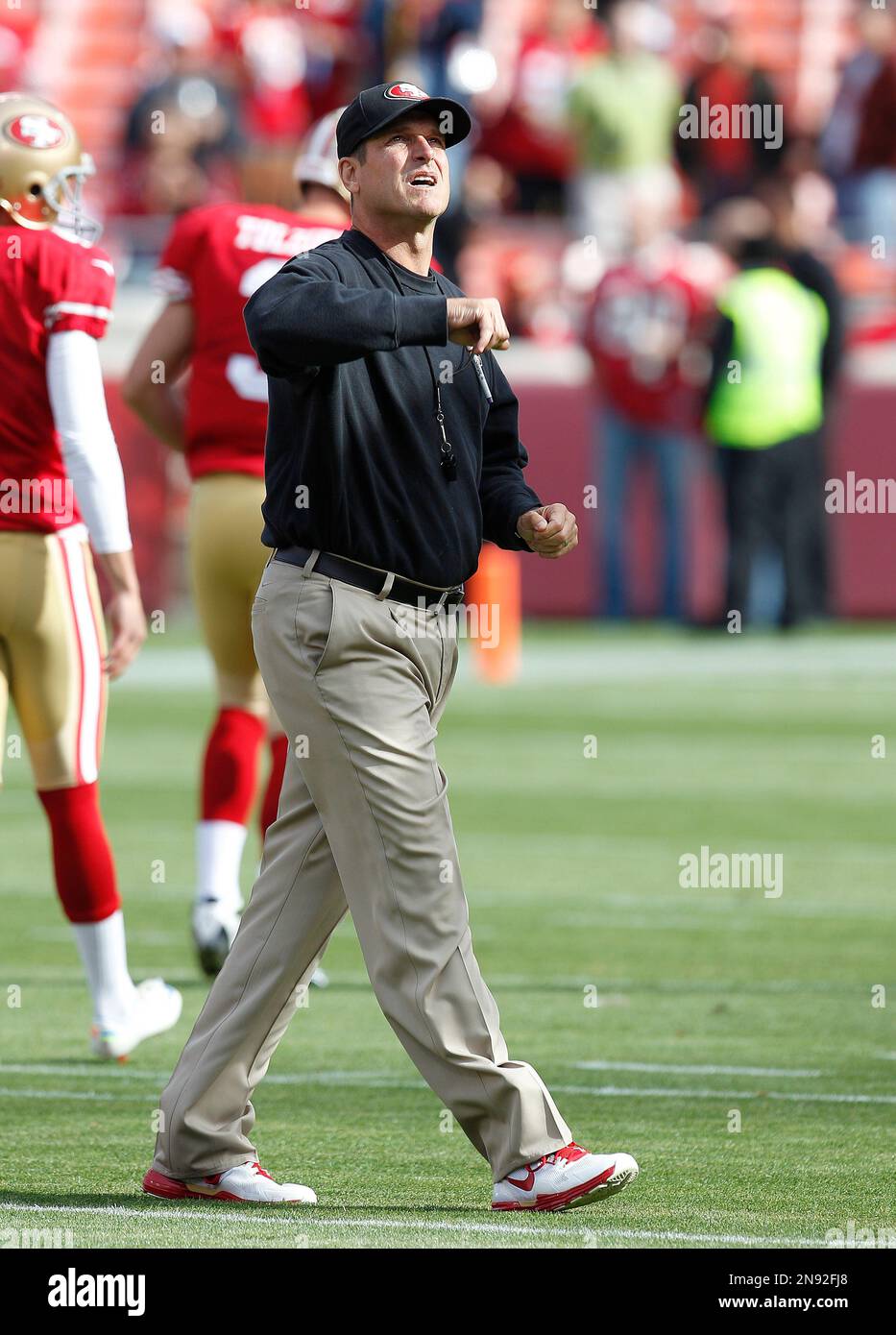 San Francisco 49ers head coach Jim Harbaugh on the field before the ...