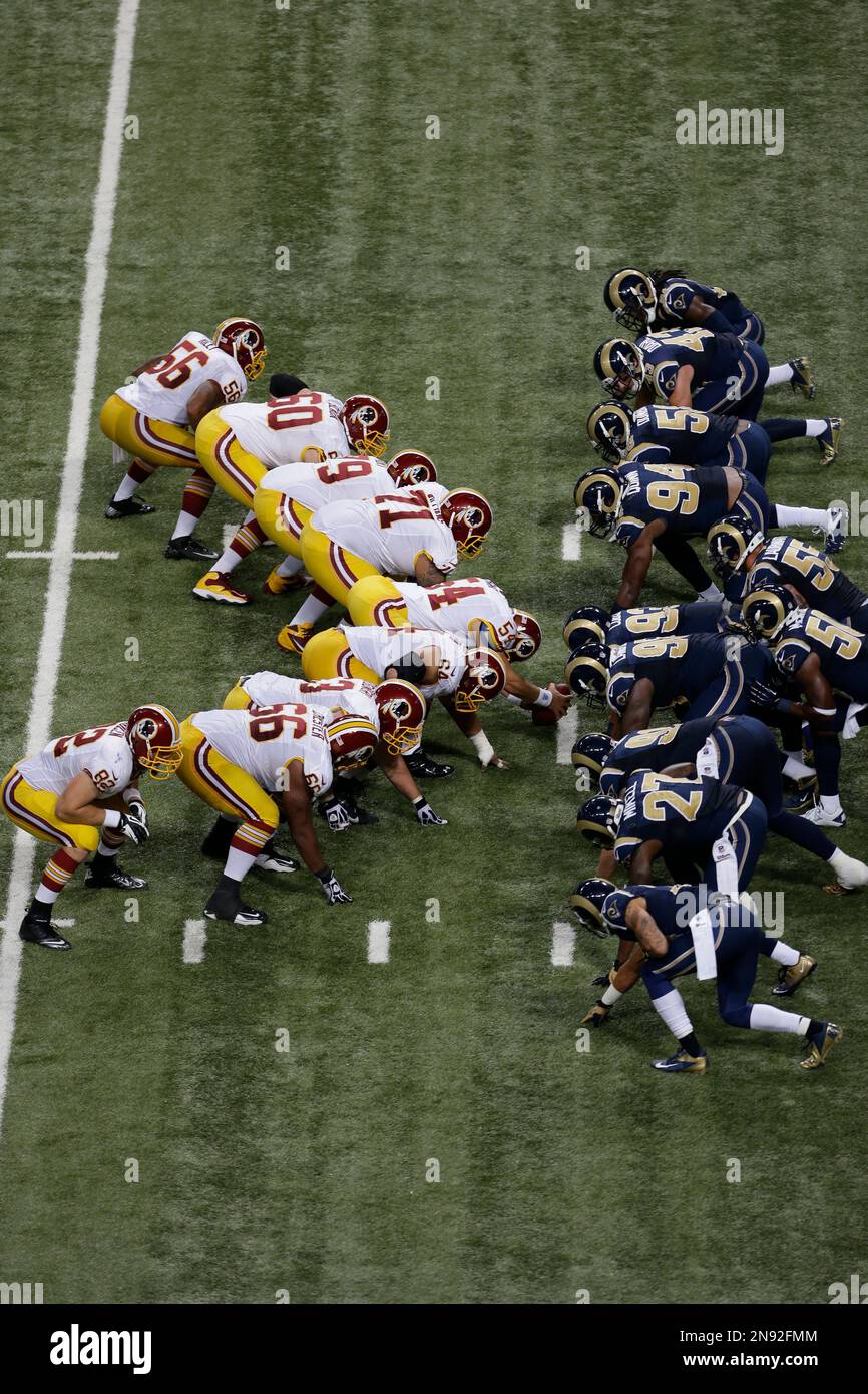 The Washington Redskins, left, and St. Louis Rams line up during the ...