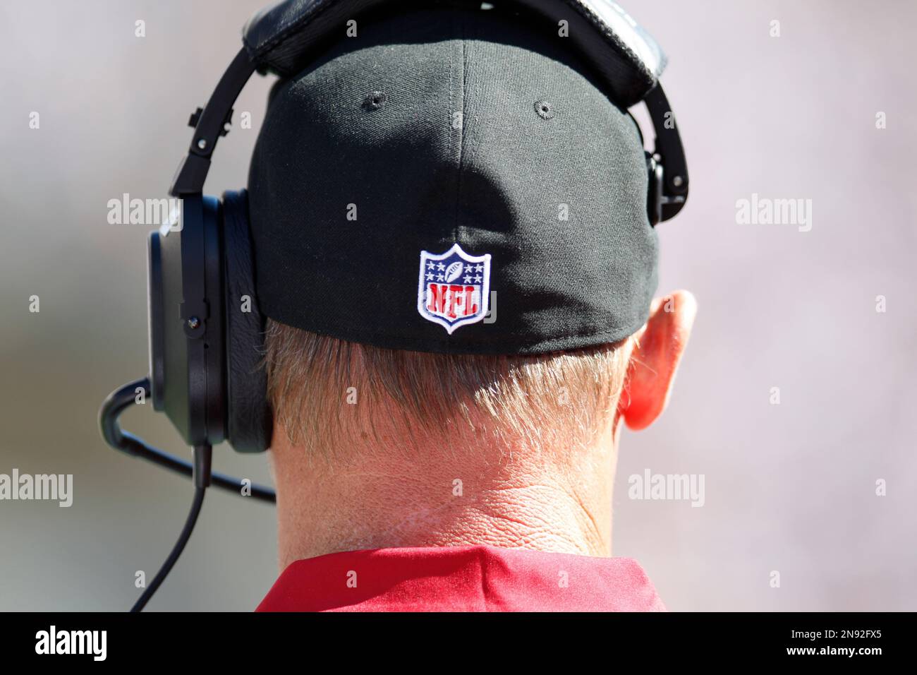 The NFL logo graces the back of the cap worn by Arizona Cardinals head ...