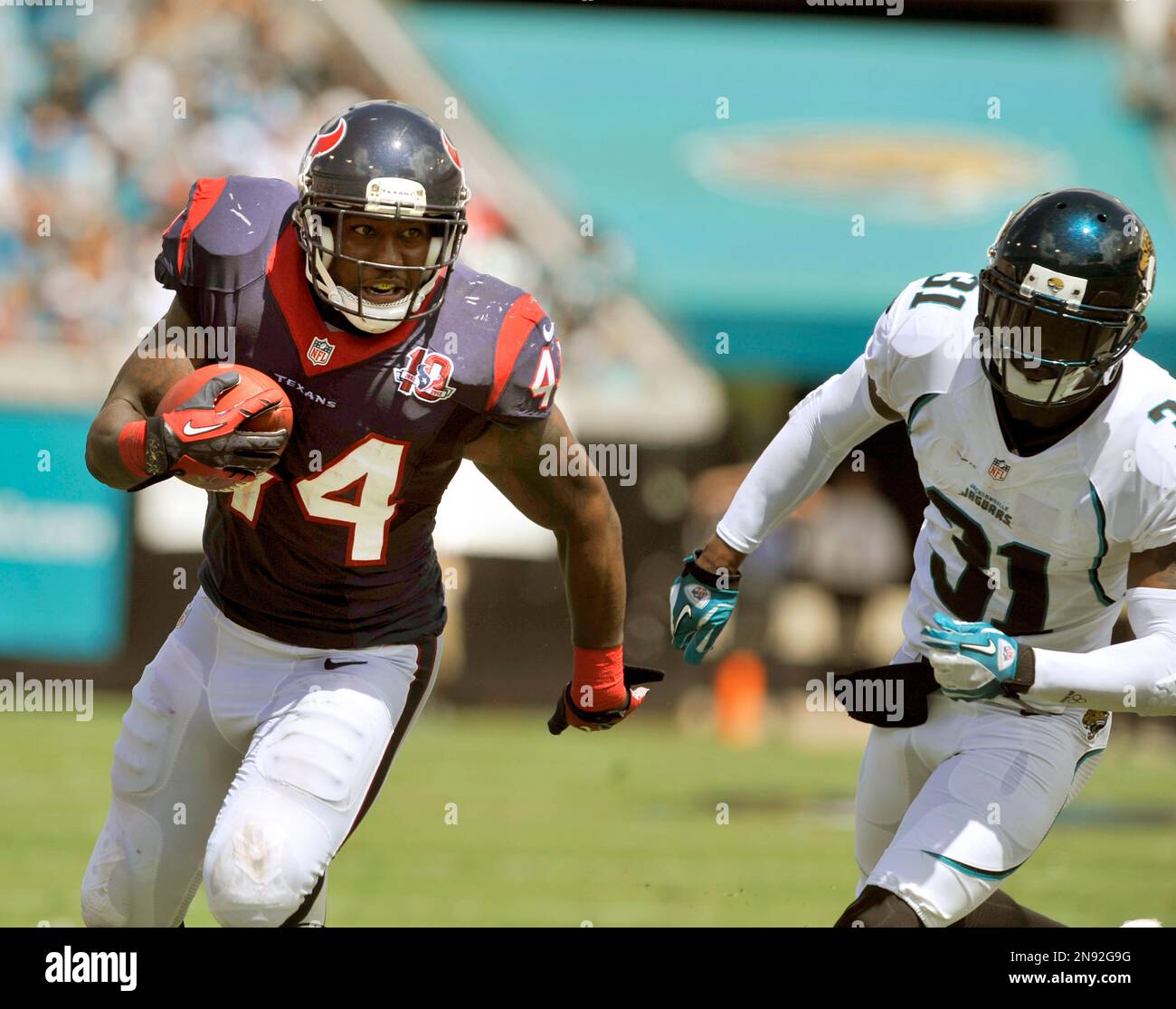 Houston Texans running back Ben Tate (44) runs away from Jacksonville ...
