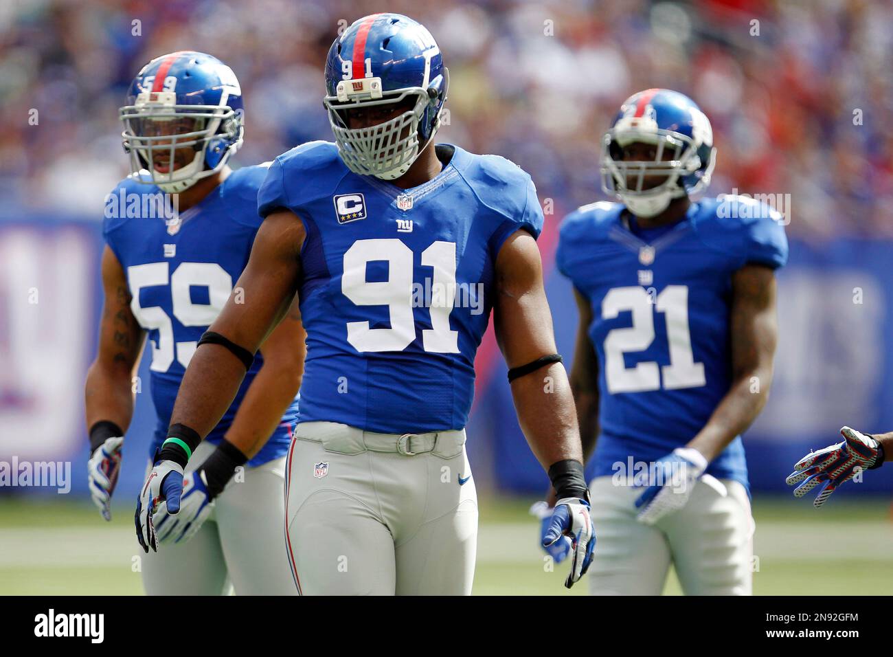 New York Giants players, from left, Michael Boley, Justin Tuck, and ...