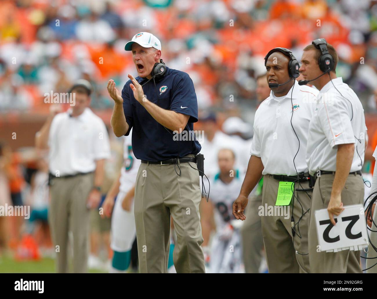 Miami Dolphins head coach Joe Philbin, center, yells out to players ...