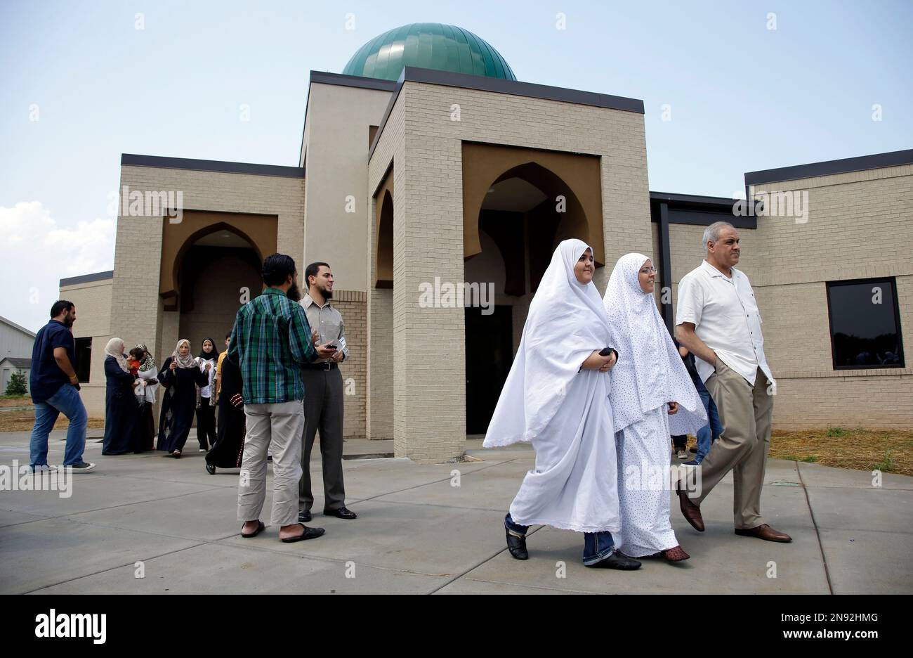 FILE - In this Aug. 10, 2012 file photo, worshipers leave the Islamic ...